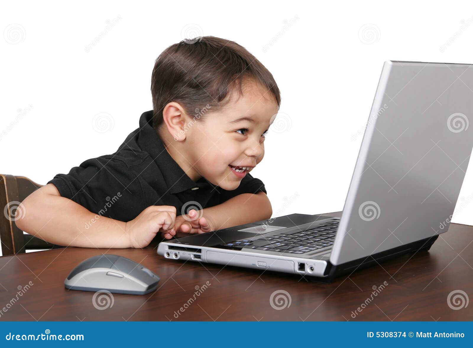 Young boy on computer stock photo. Image of people, games - 5308374