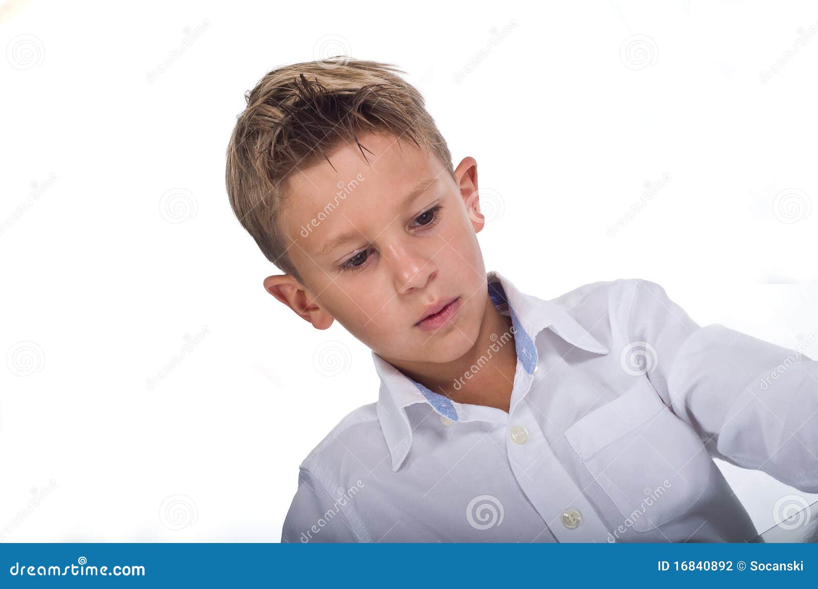 Young Boy Concentrating stock photo. Image of looking - 16840892