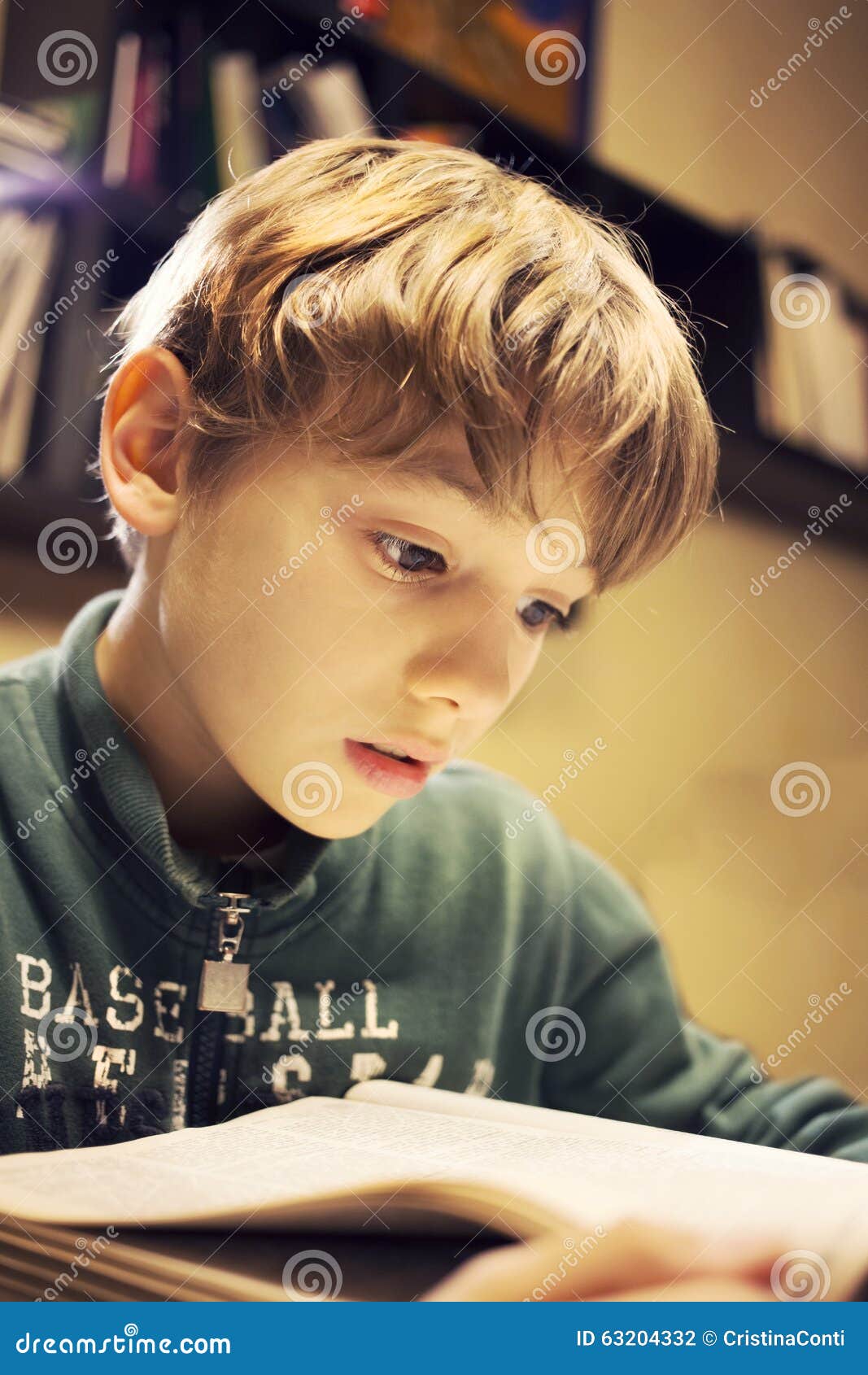 A Young Boy Concentrating on Homework Stock Photo - Image of boys, cute ...