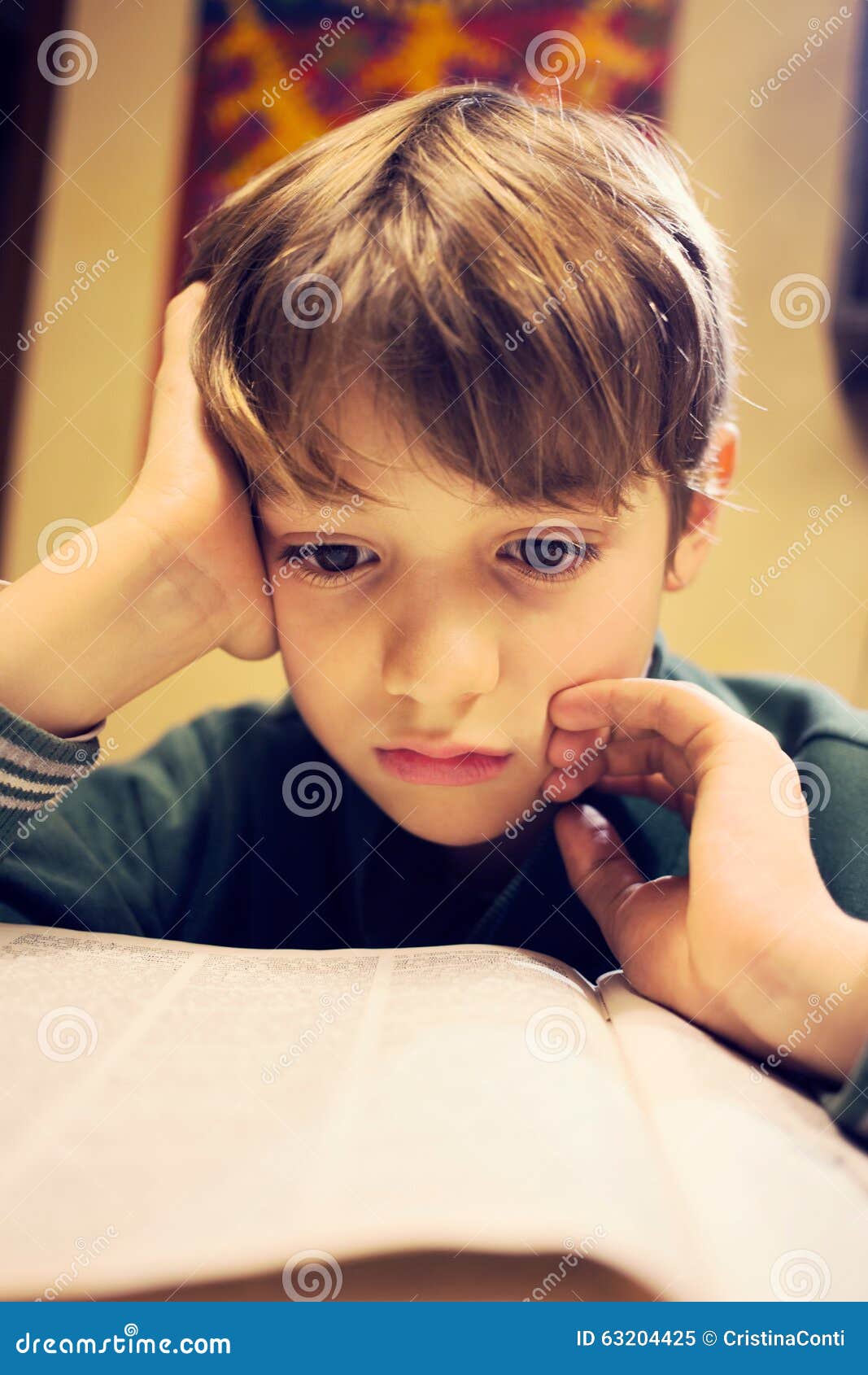 A Young Boy Concentrating on Homework Stock Image - Image of male ...