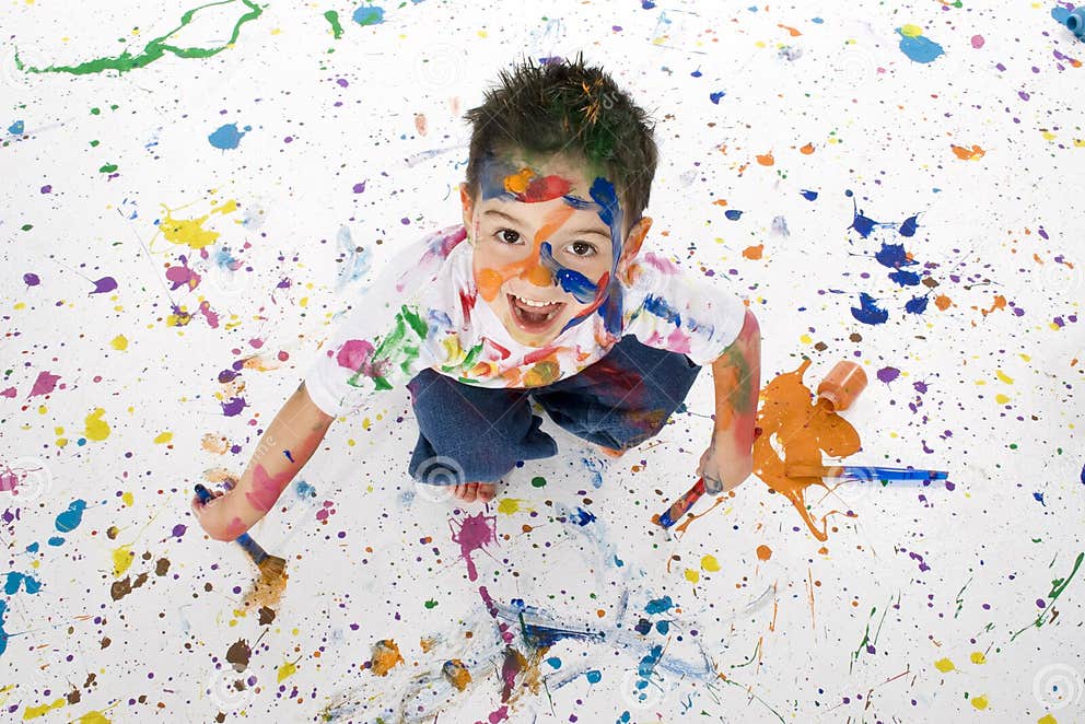 Young Boy Covered in Paint Splatter Stock Photo - Image of artist ...