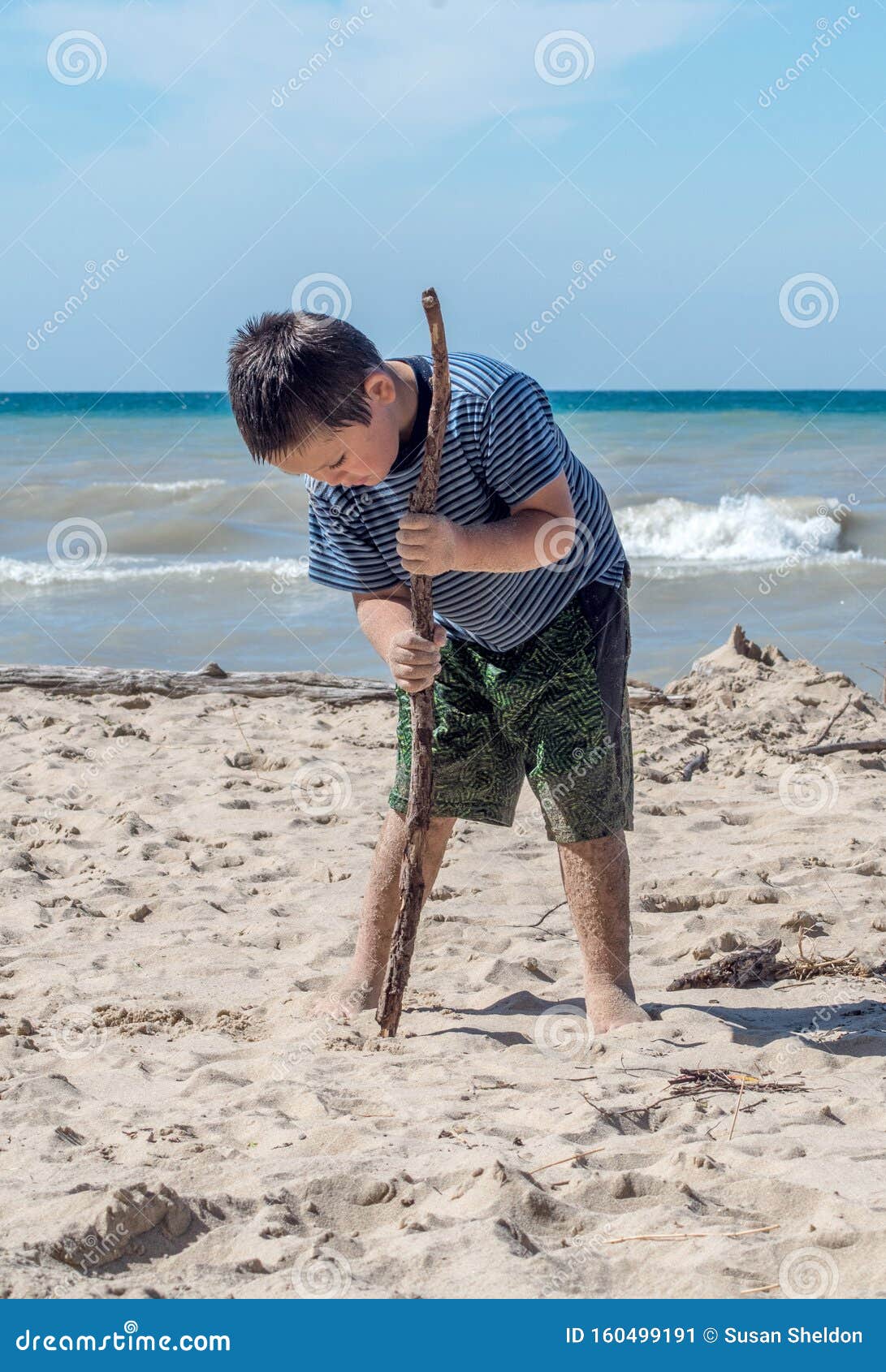 Sandy Little Boy Digging On The Beach Stock Image - Image of summer ...