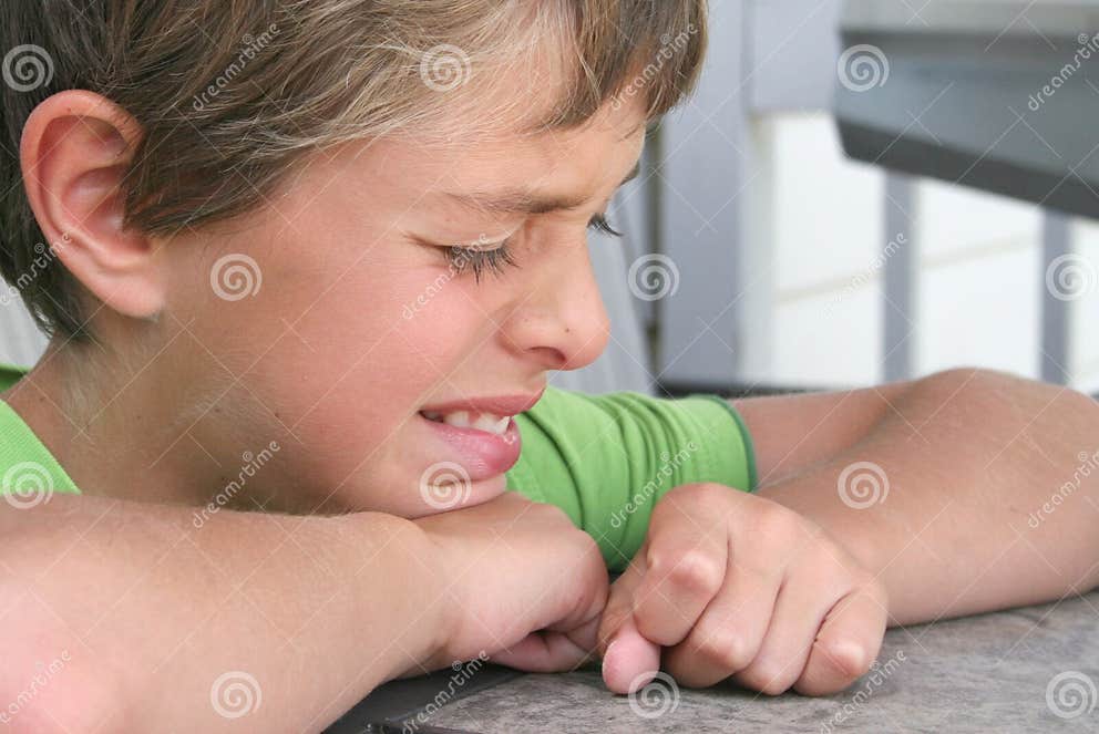 Young Boy Crying at a Table Stock Image - Image of miserable, tears ...