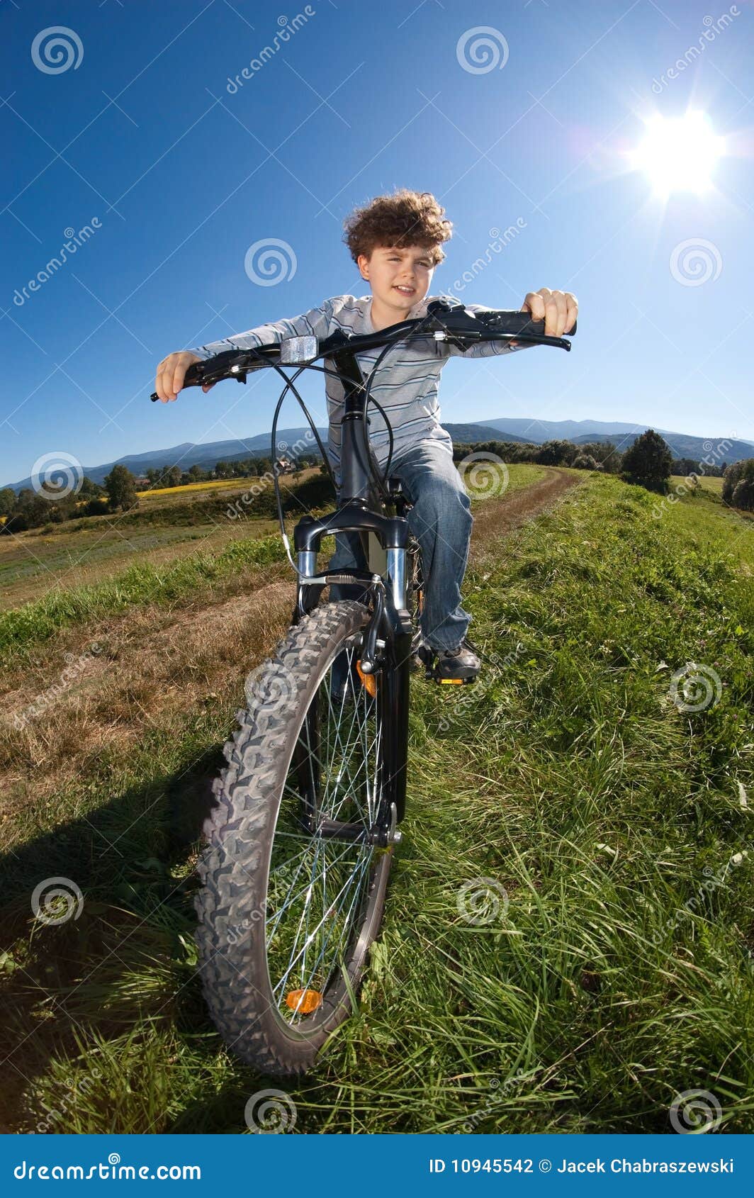 Young boy cycling stock photo. Image of cycle, colour - 10945542