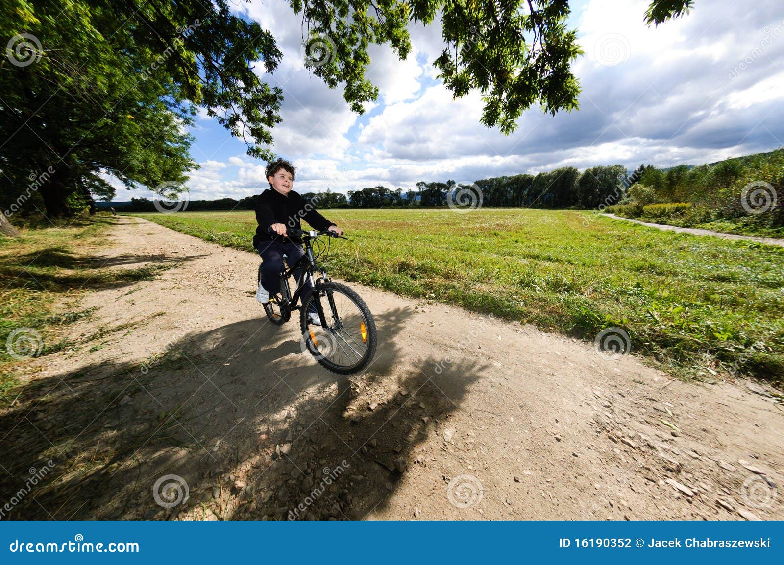 Young boy cycling stock photo. Image of child, daytime - 16190352