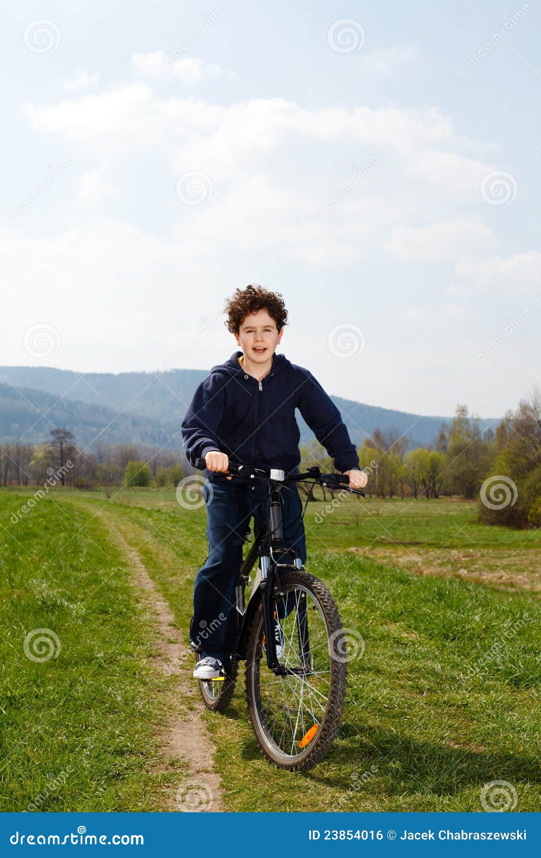 Young boy cycling stock photo. Image of riding, child - 23854016