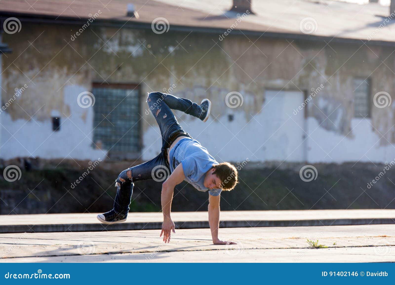 A Young Boy Dancing Breakdance on the Street. Stock Photo - Image of ...