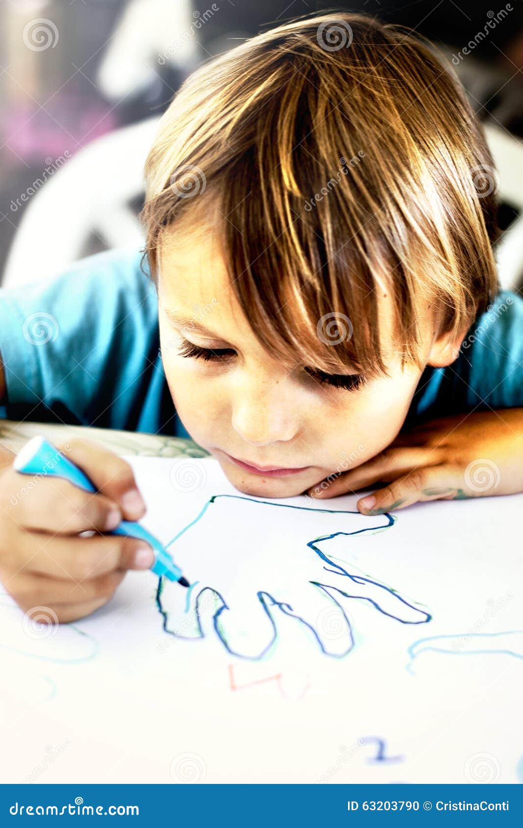 A Young Boy is Doing Drawing Stock Photo - Image of hope, childhood ...