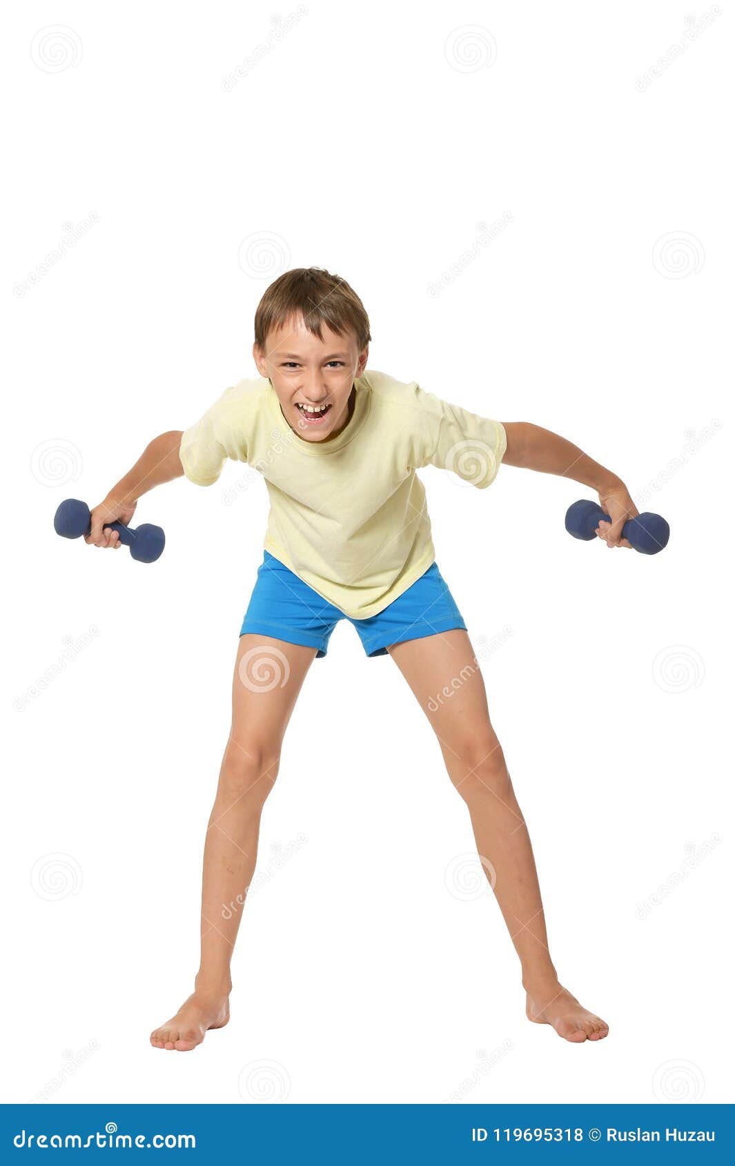 Young boy doing exercises stock photo. Image of male - 119695318