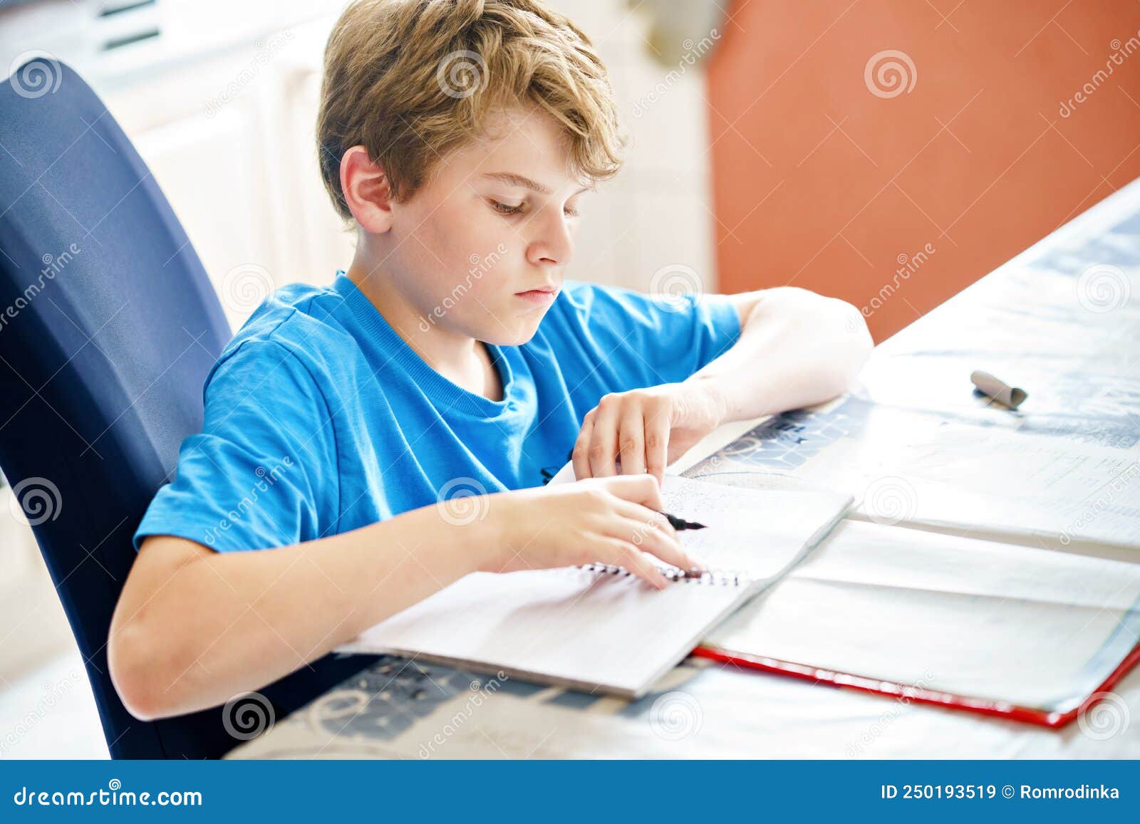 Young Boy Doing His Homework at Home. School Kid Learning Stock Image ...