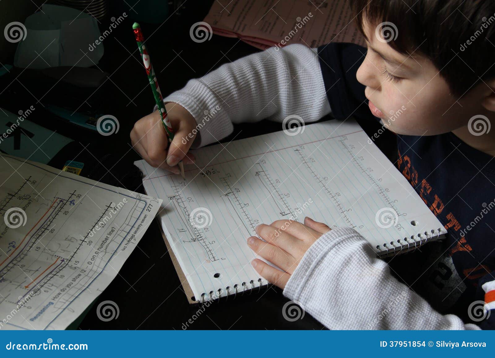 Young boy doing homework stock photo. Image of pencil - 37951854