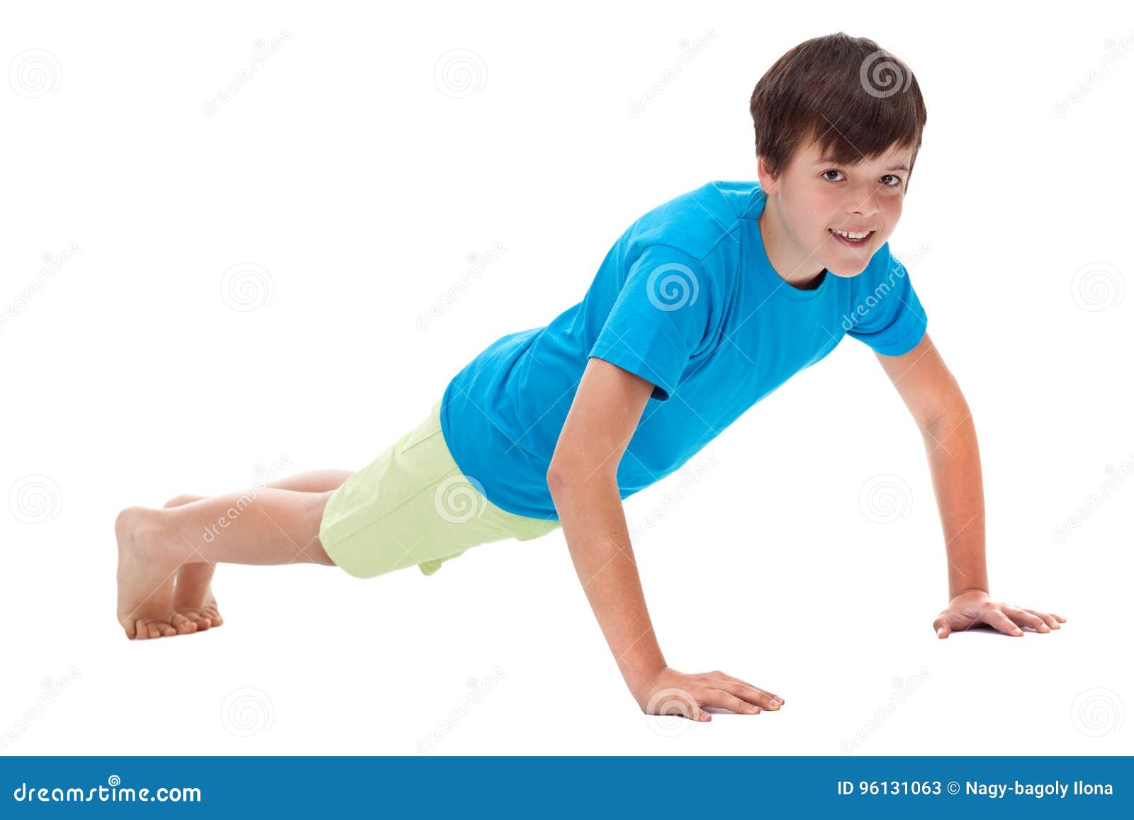 Young boy doing push ups stock image. Image of sport - 96131063
