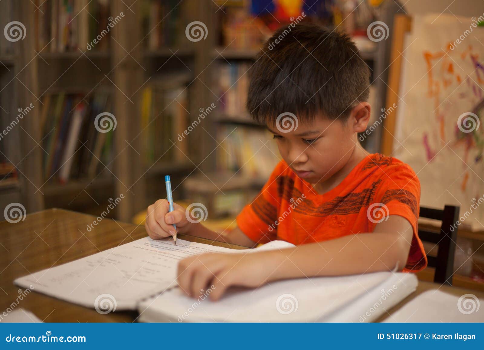 Young Boy Doing School Work Stock Image - Image of asian, homeschool ...