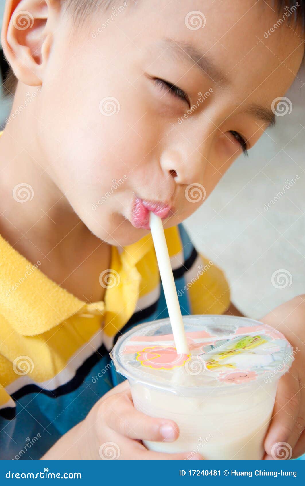 Young boy and a drink stock image. Image of playful, sweet - 17240481