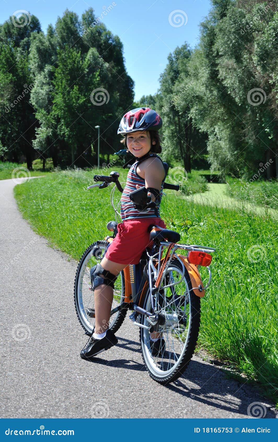 Young Boy Drive Bicycle Royalty-Free Stock Photo | CartoonDealer.com ...