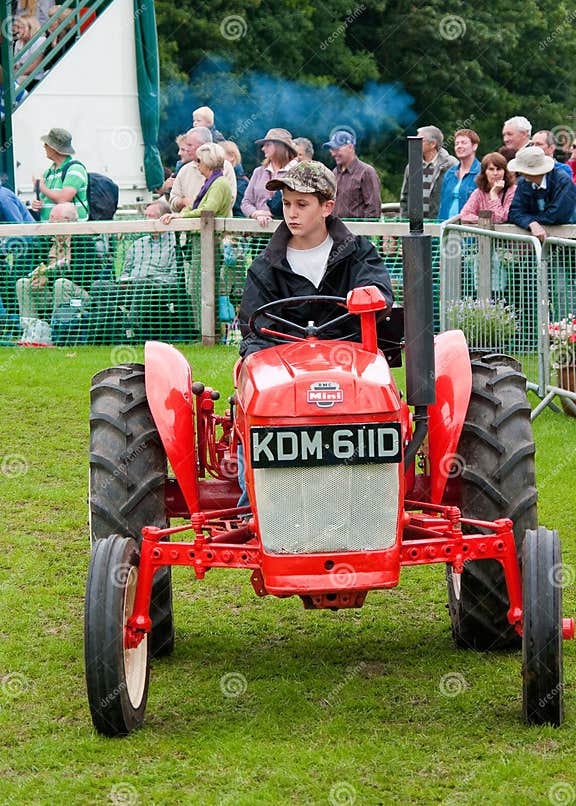Young Boy Driving Old Tractor Editorial Stock Image - Image of carriage ...