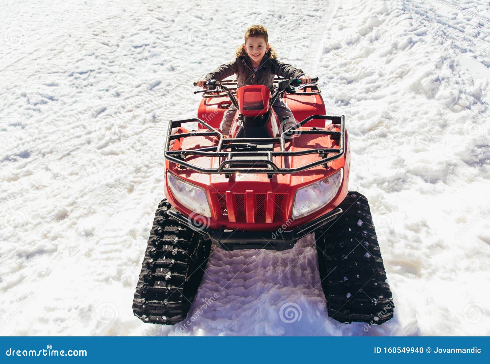 Boy Driving Snowmobile in a Winter Landscape Stock Photo - Image of ...