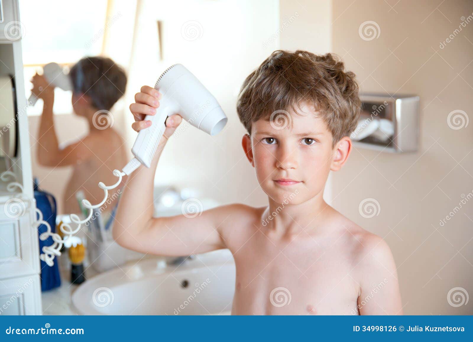 Young boy drying hair stock photo. Image of person, fresh - 34998126