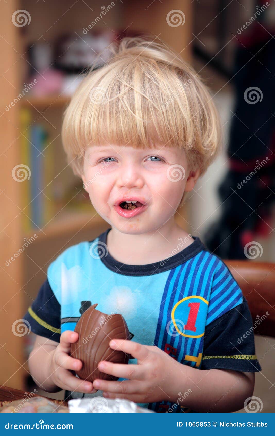 Young Boy Eating and Enjoying Chocolate Easter Egg Stock Image - Image ...