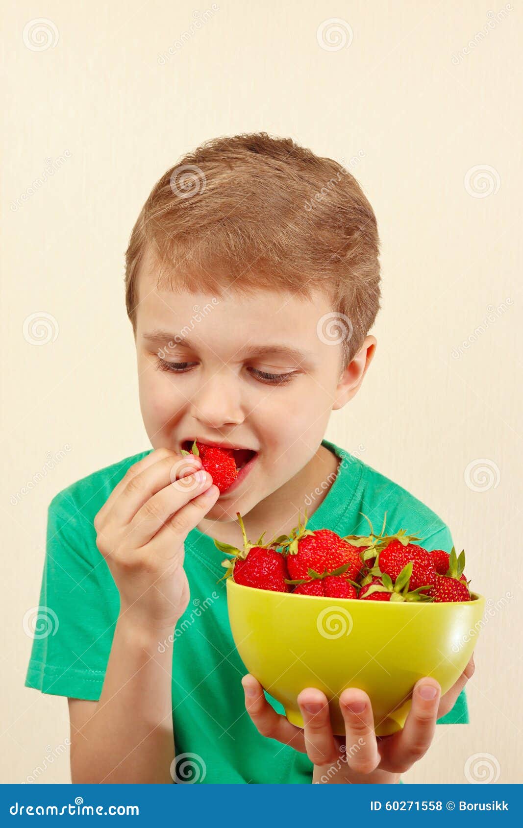 Young Boy Eating Fresh Ripe Strawberries from Bowl Stock Photo - Image ...