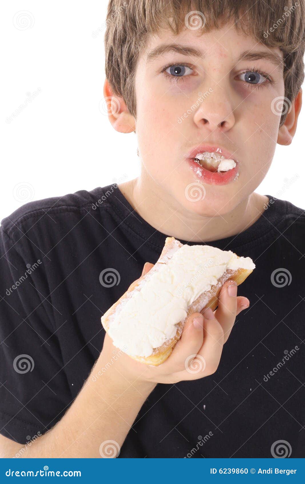 Young boy eating a pastry stock photo. Image of baked - 6239860