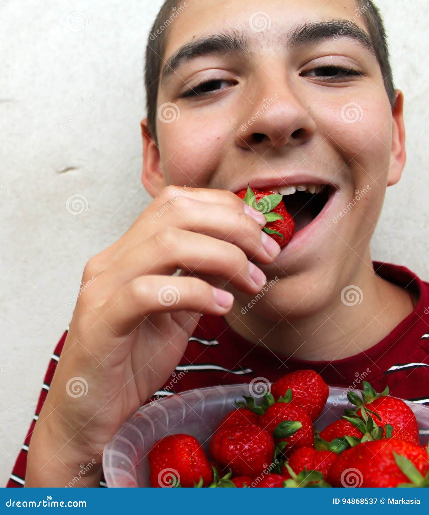 Young Boy Eating a Ripe Strawberry. Stock Image - Image of hand ...