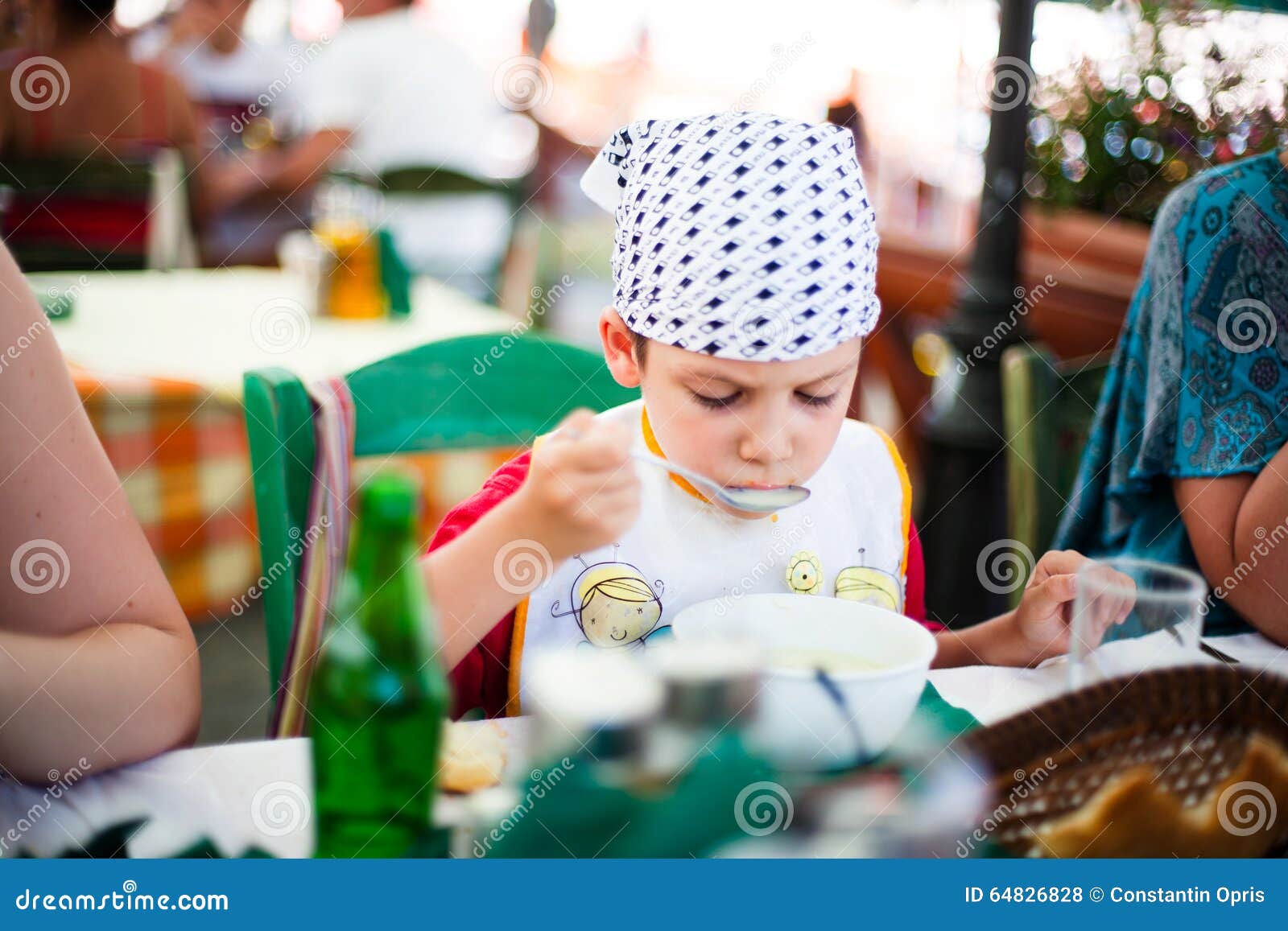 Young boy eating soup stock photo. Image of indoors, sitting - 64826828