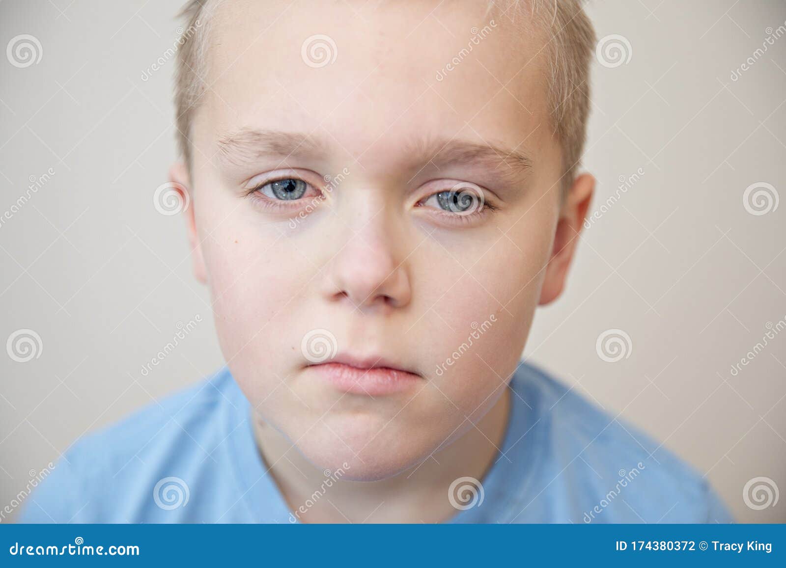 Young Boy with Either a Tired, or Sad Look on His Face Stock Photo ...