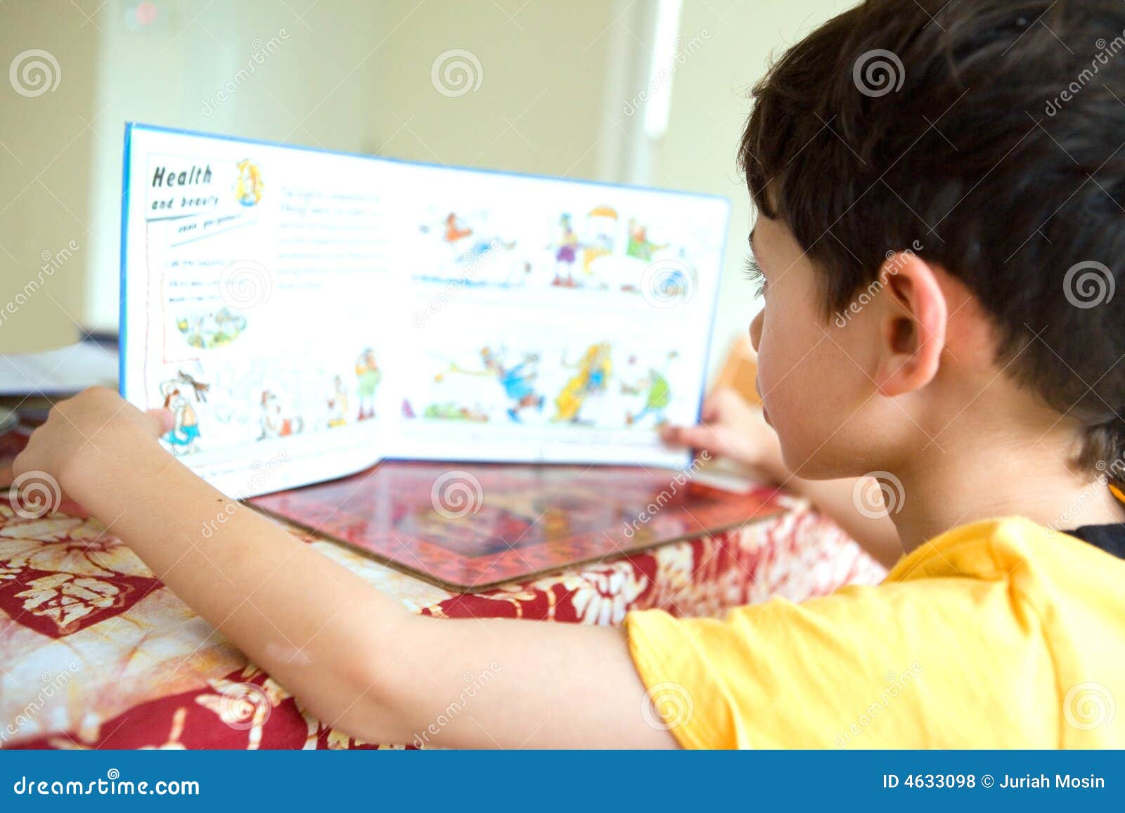 Young Boy Engross in His Storybook Stock Photo - Image of homework ...