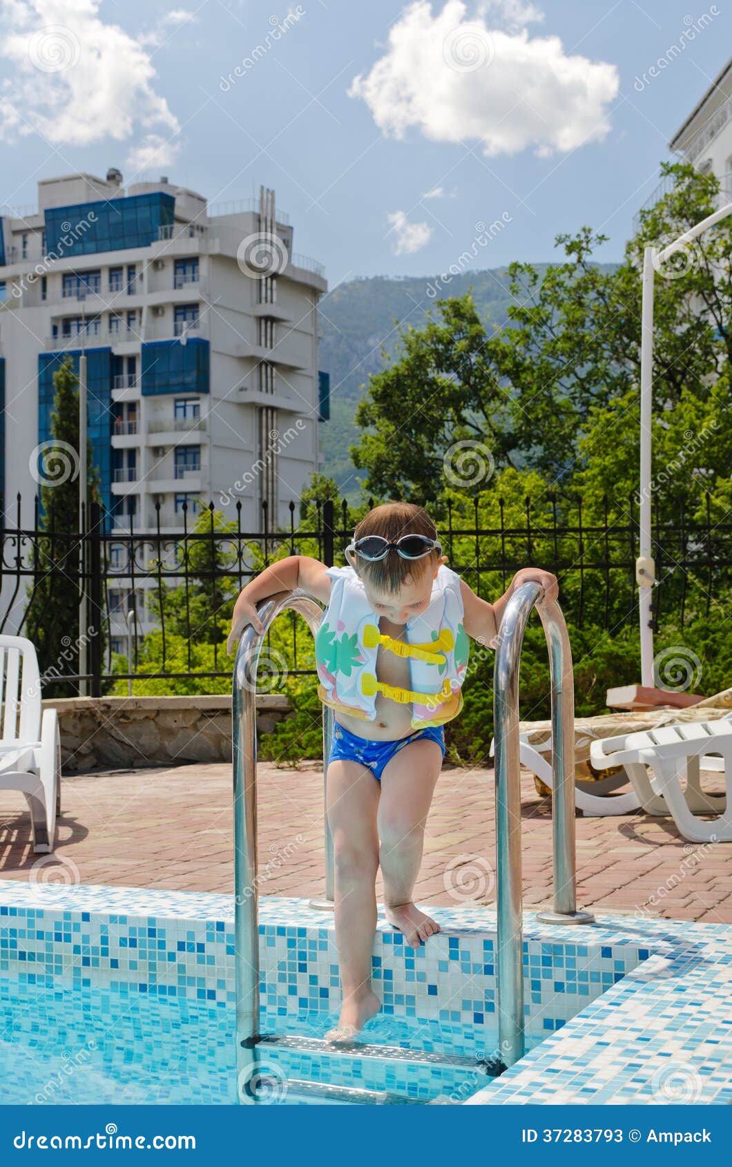 Young Boy Entering a Swimming Pool Stock Image - Image of enjoyment ...