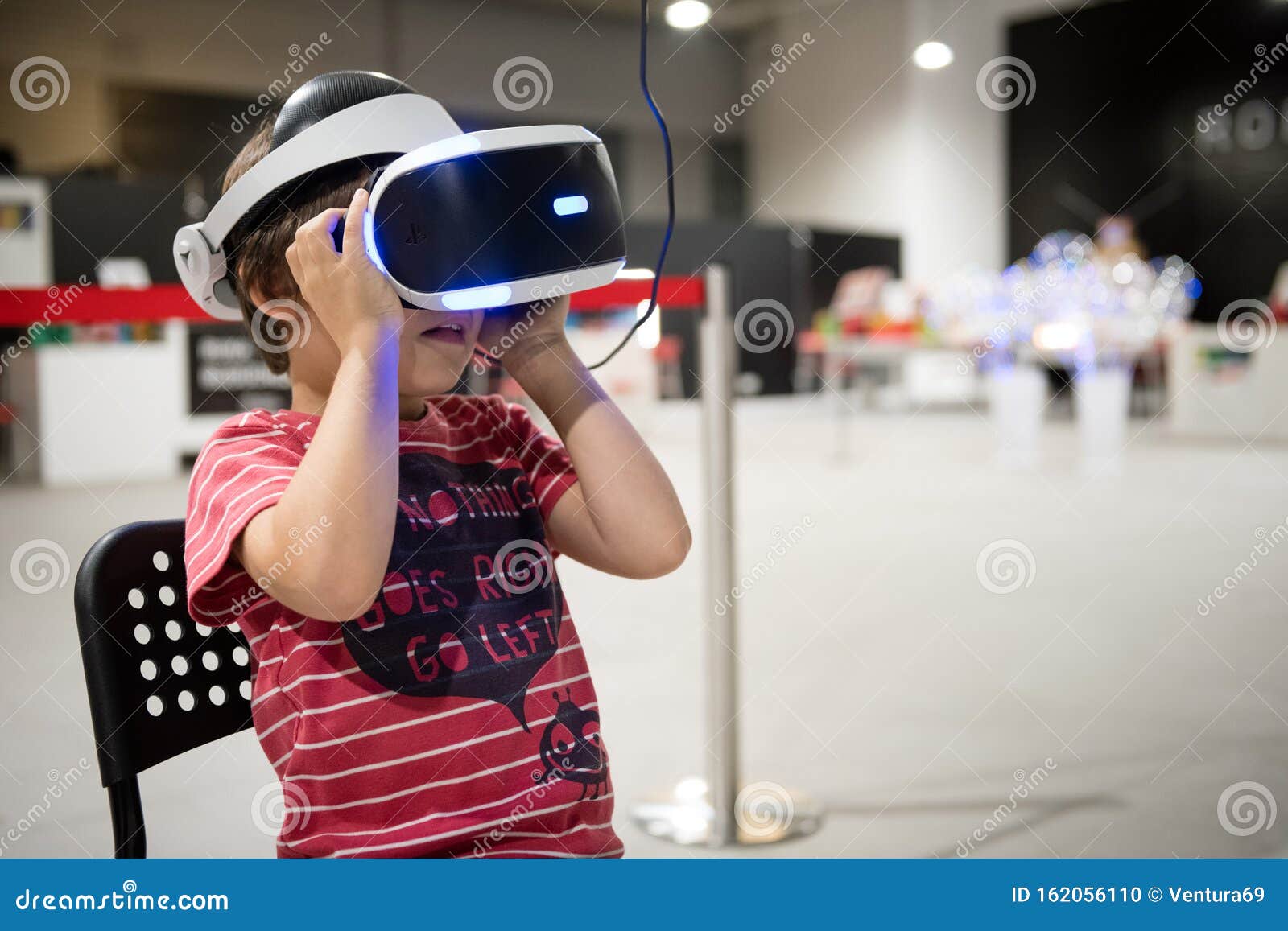 Young Boy Exploring Computer Simulation Using Virtual Reality Glasses ...