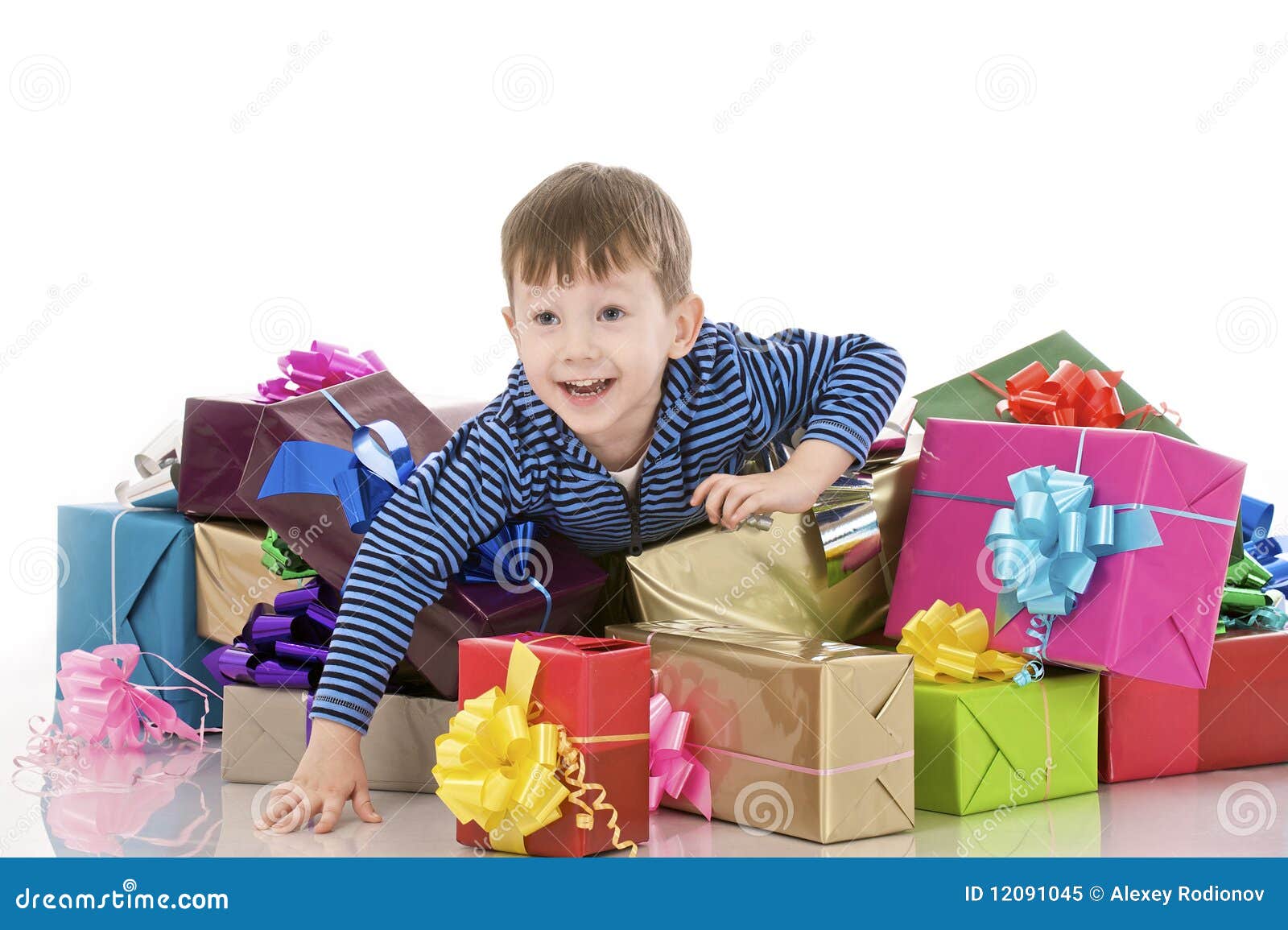 Young boy and fancy boxes stock image. Image of holiday - 12091045