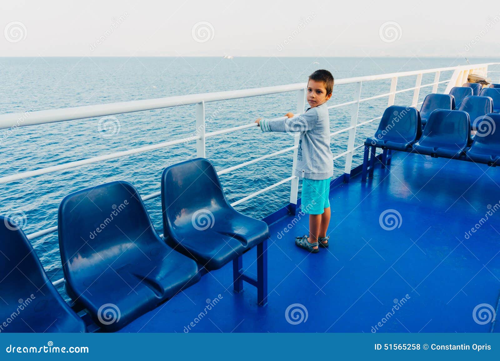 Young boy on a ferry-boat stock photo. Image of voyage - 51565258