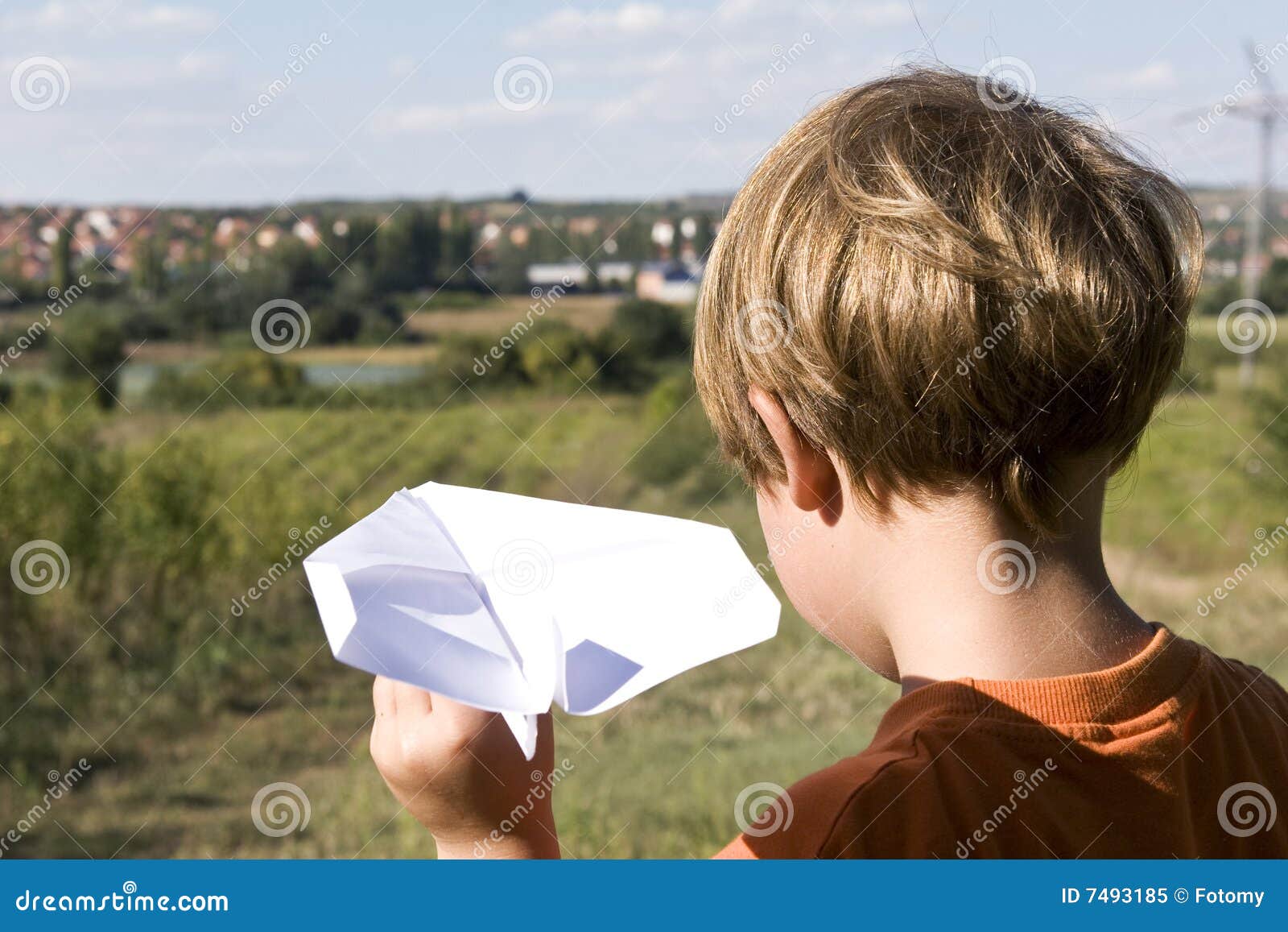 Young Boy Flying a Paper Plane Stock Image - Image of plane, dart: 7493185