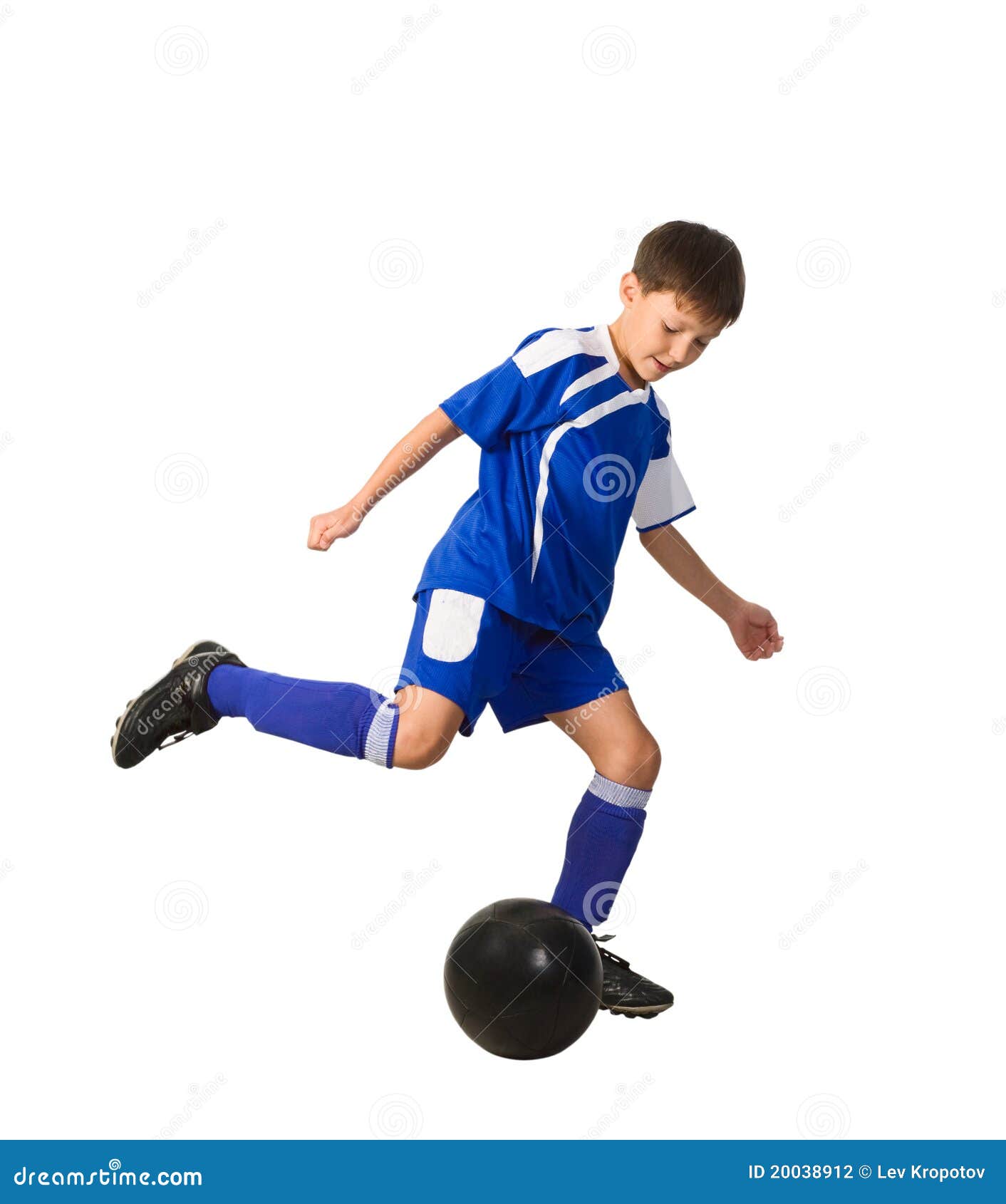 A Young Boy Football Player Stock Photo - Image of childhood, playing ...