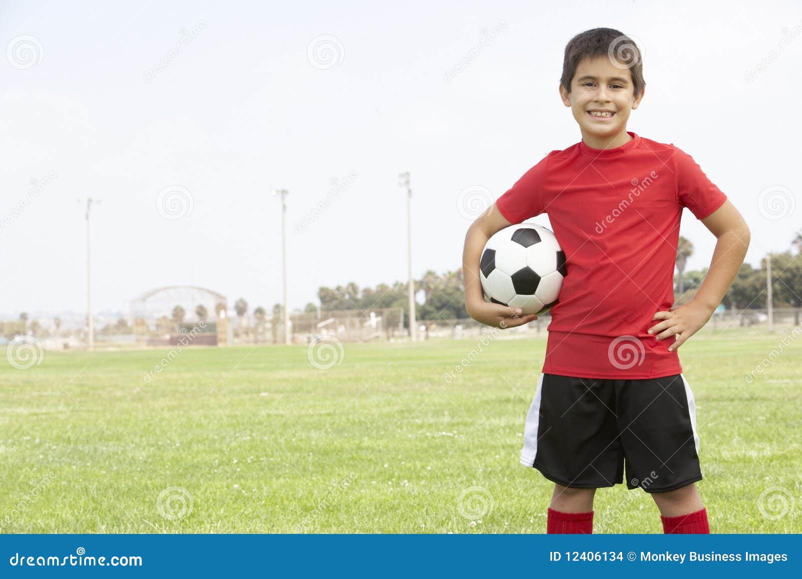 Young Boy in Football Team stock photo. Image of person - 12406134