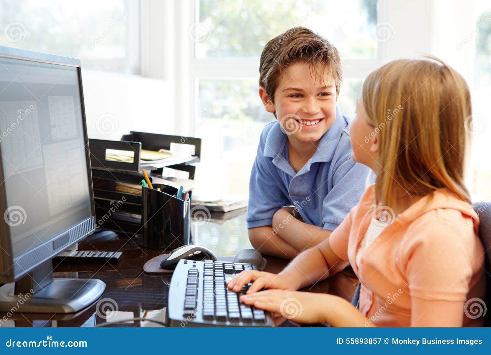 Young Boy and Girl Using Computer at Home Stock Image - Image of male ...