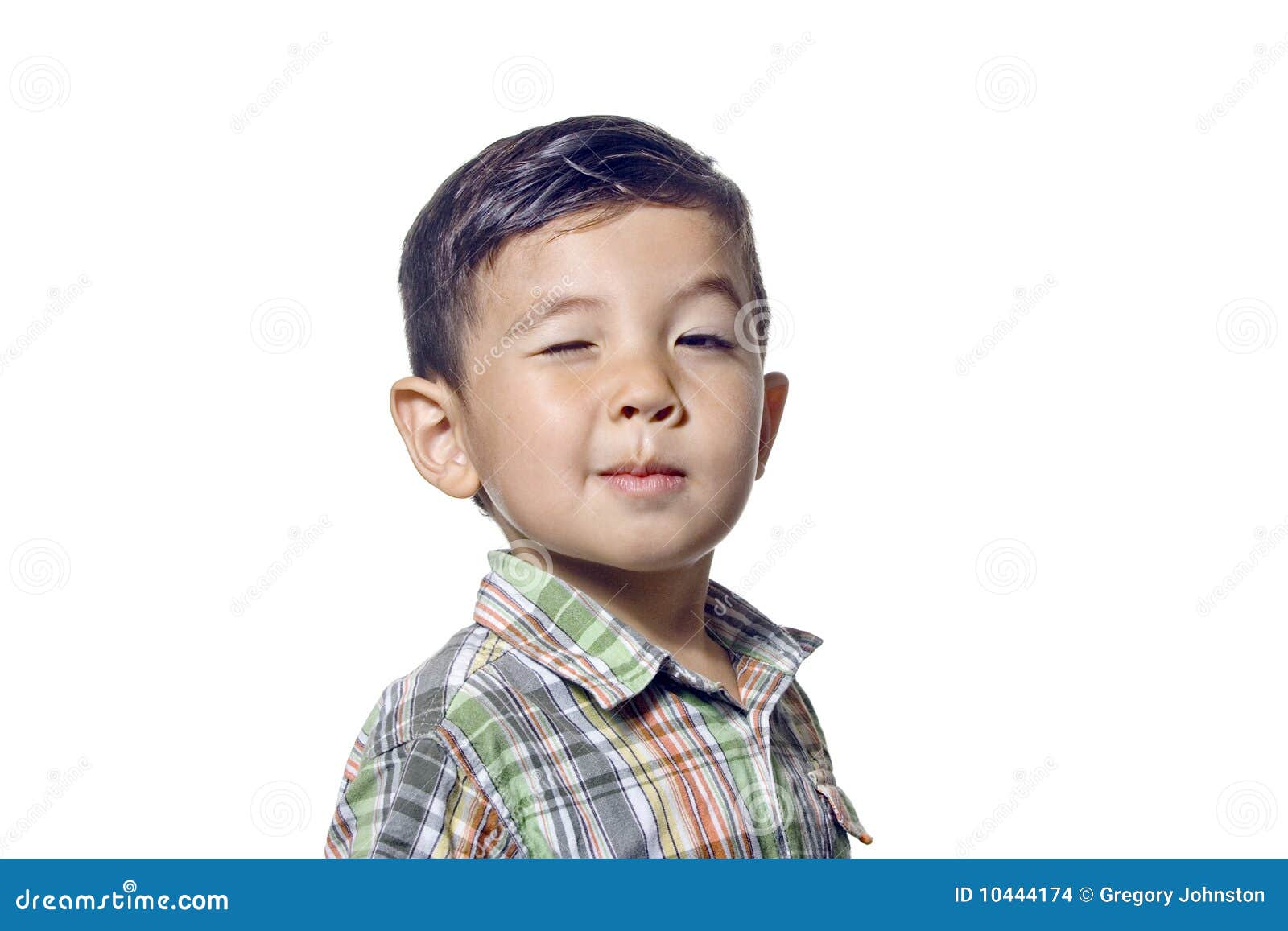 Young boy gives a wink. stock photo. Image of eyes, male - 10444174