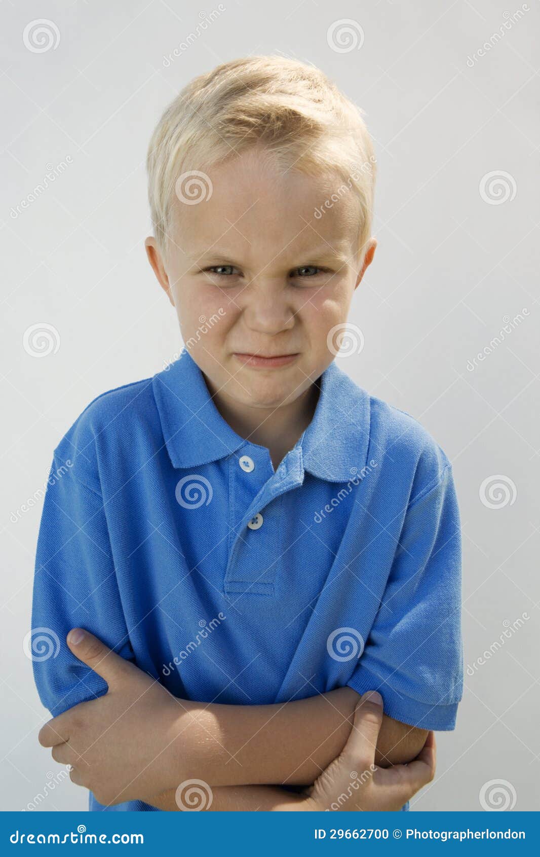 Young Boy Glaring stock photo. Image of brat, folded - 29662700