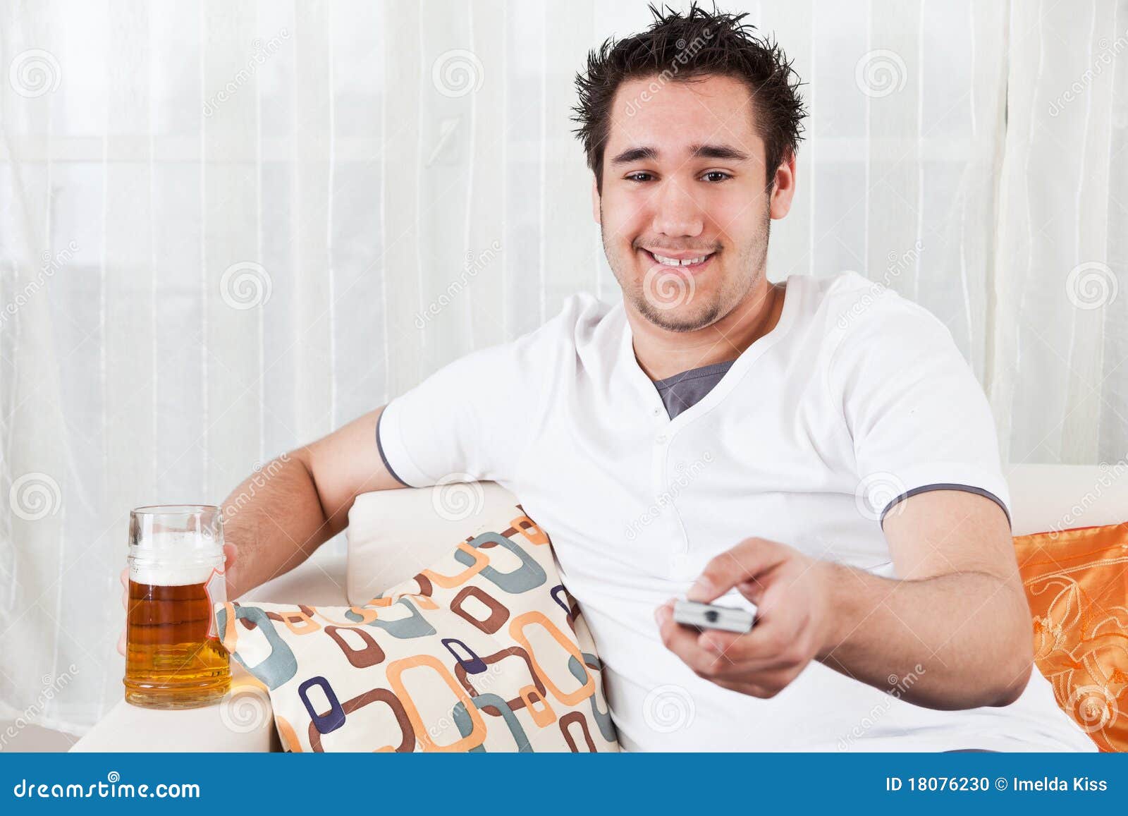 Young Boy with a Glass of Beer and Remote Control Stock Photo - Image ...