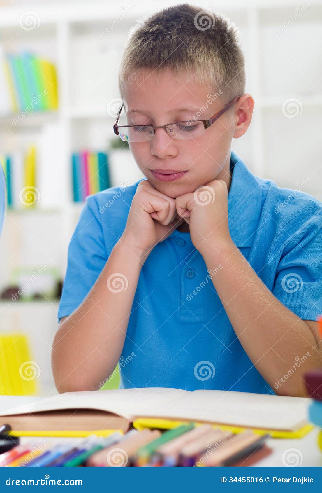 Young Boy with Glasses Learns from Books Stock Photo - Image of ...