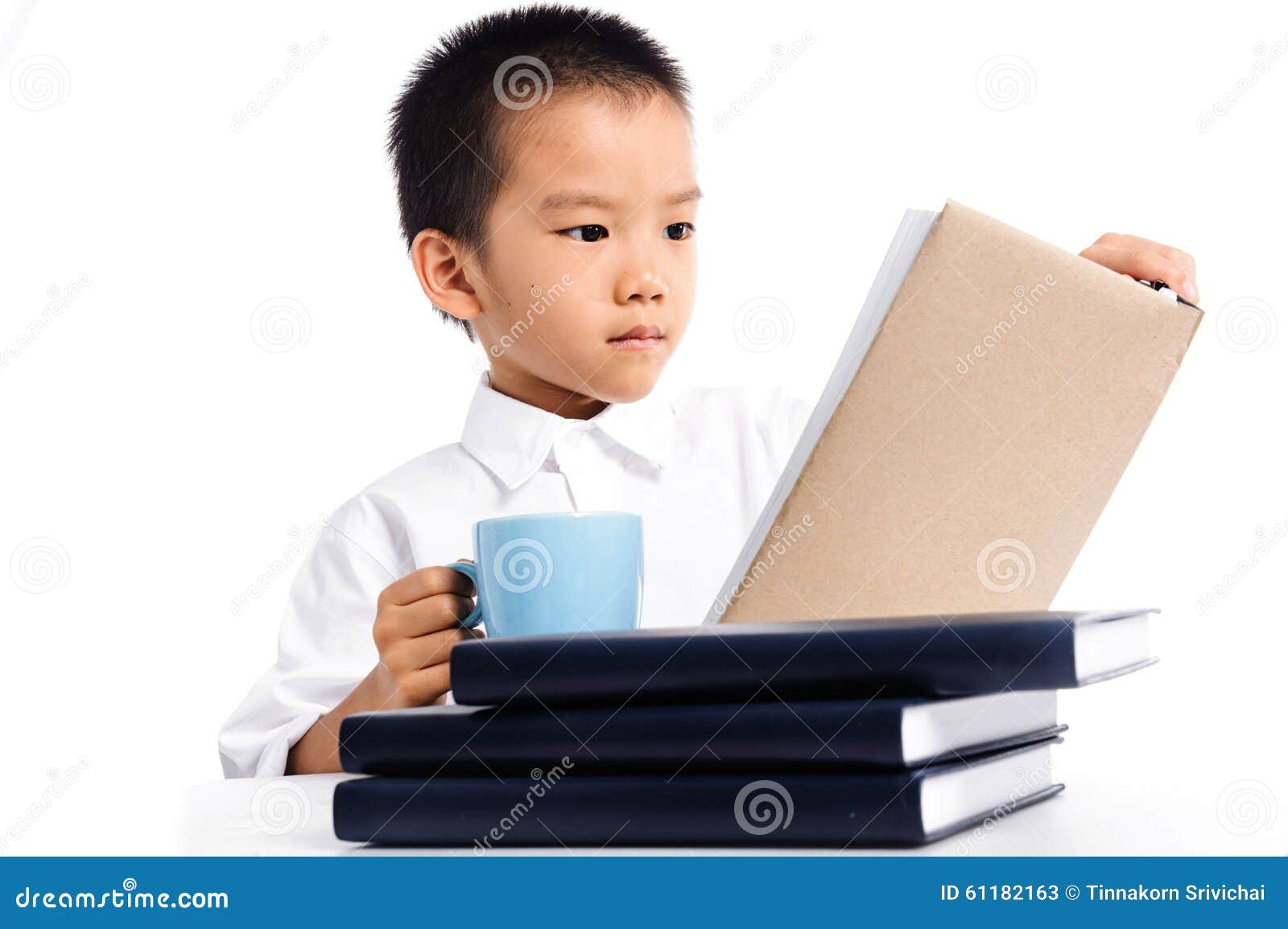 Young Boy Has a Cup of Milk Reading Book Stock Image - Image of casual ...