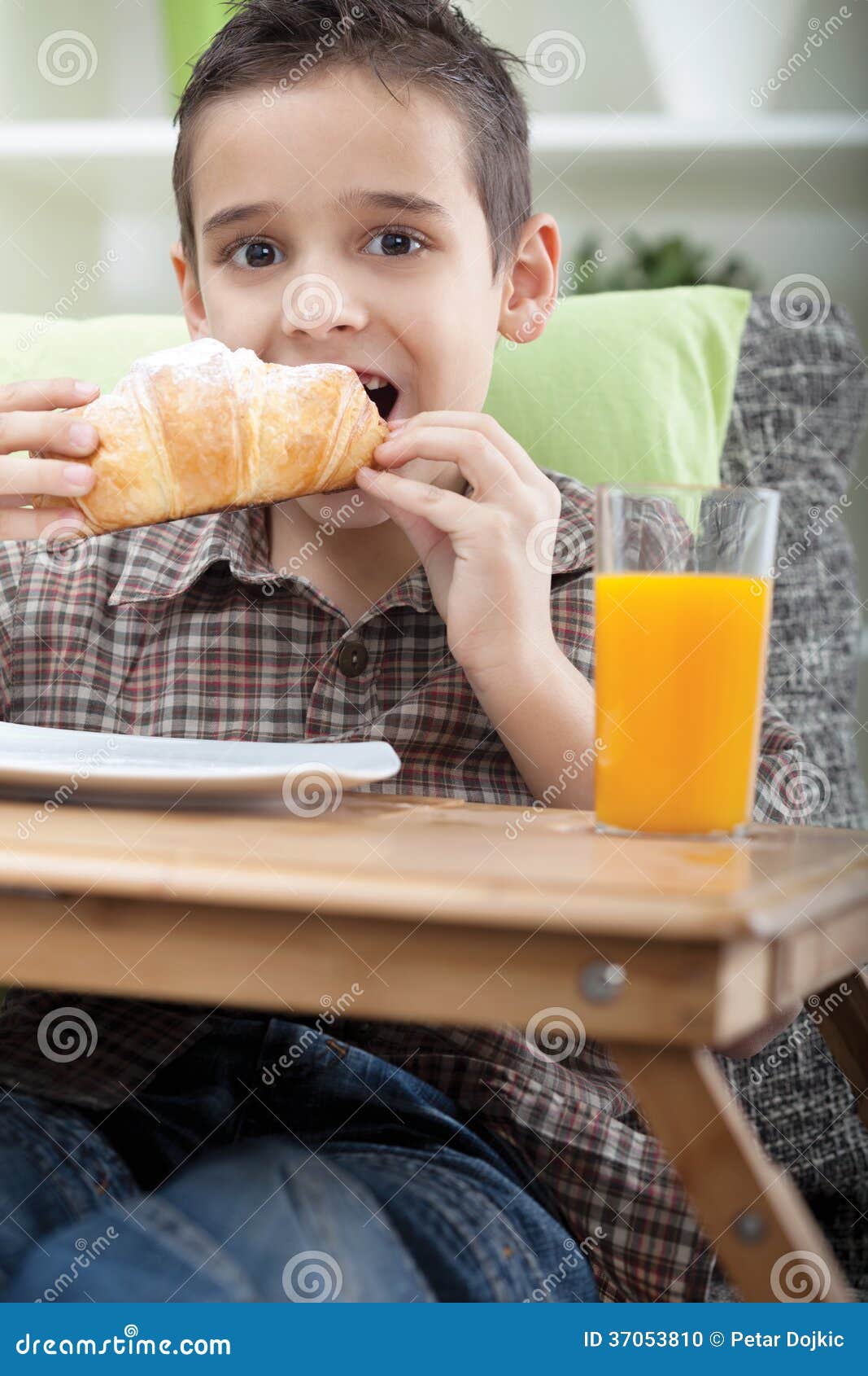 Young boy having breakfast stock photo. Image of people - 37053810