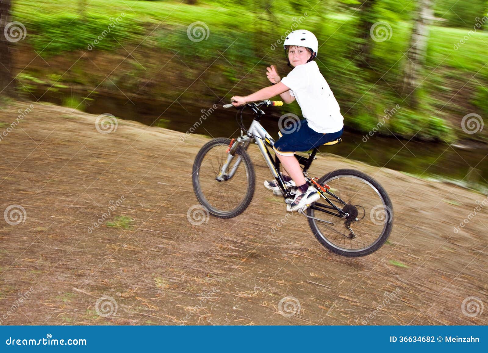 Young Boy with Helmet is Riding Stock Photo - Image of open, mountain ...