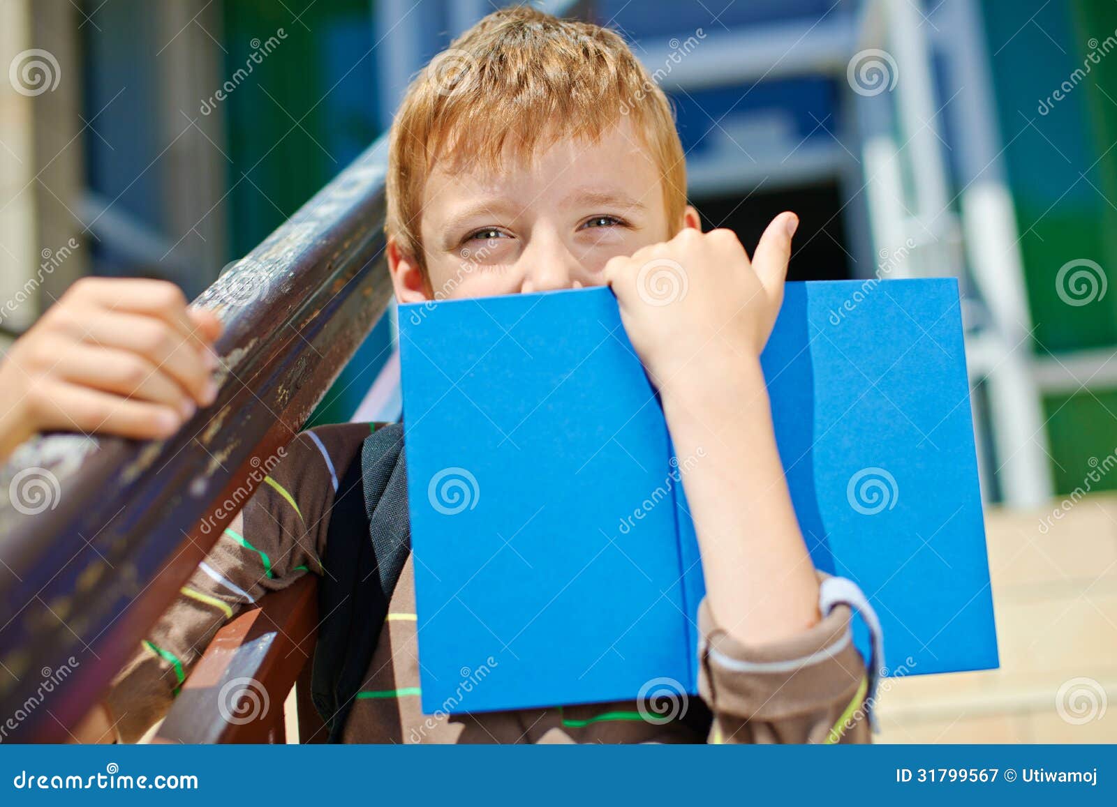 Young Boy is Hiding Behind Book. Stock Image - Image of backpack ...