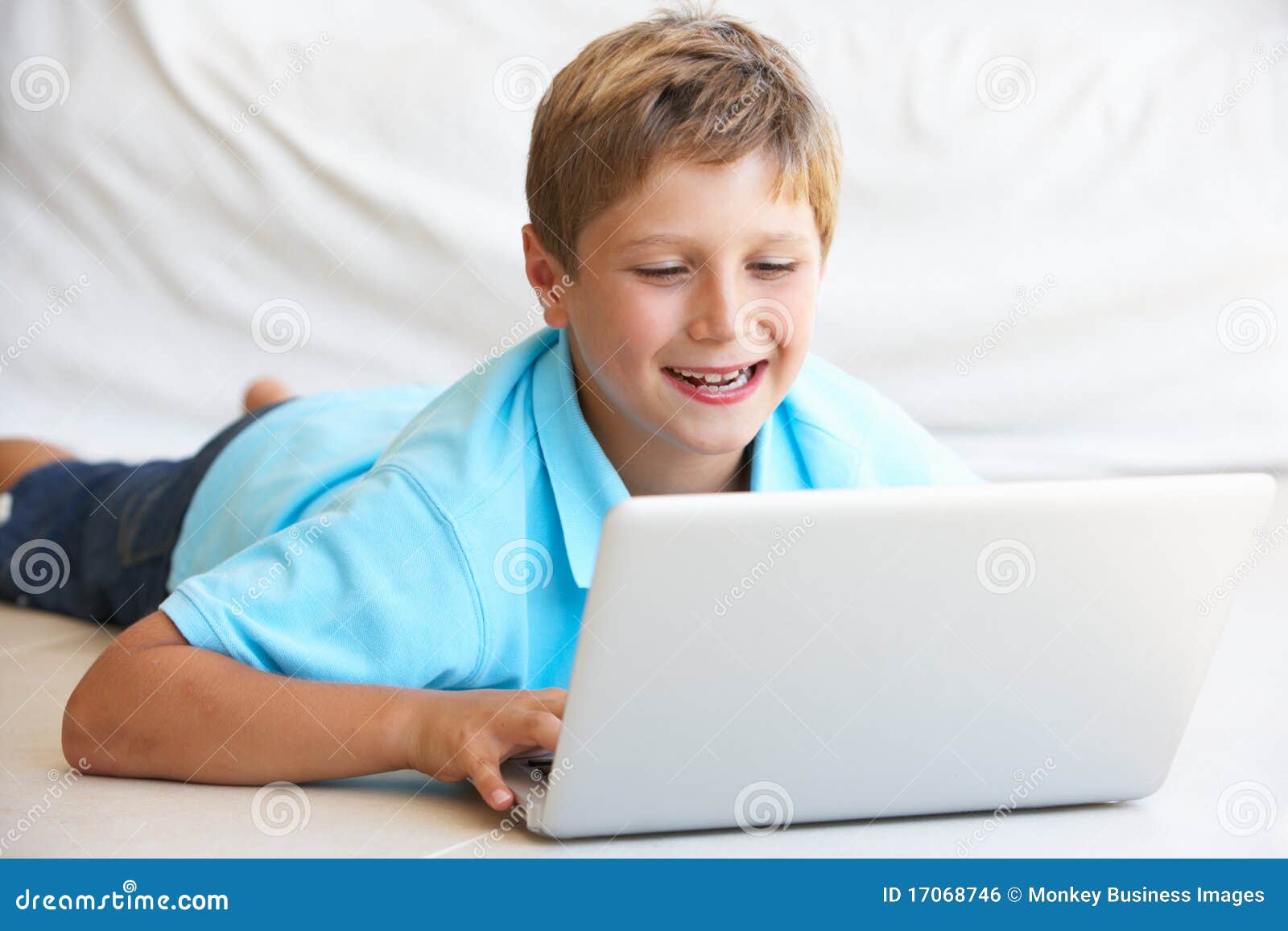 Young Boy on His Laptop Computer Stock Photo - Image of smiling ...