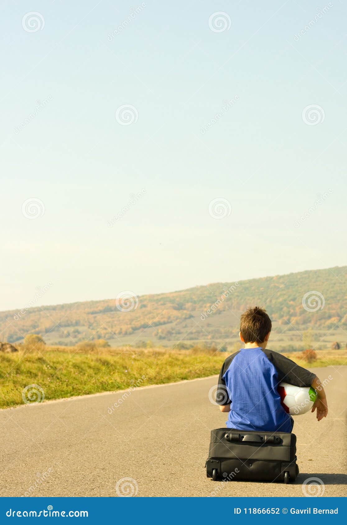 Young boy hitching on road stock photo. Image of childhood - 11866652