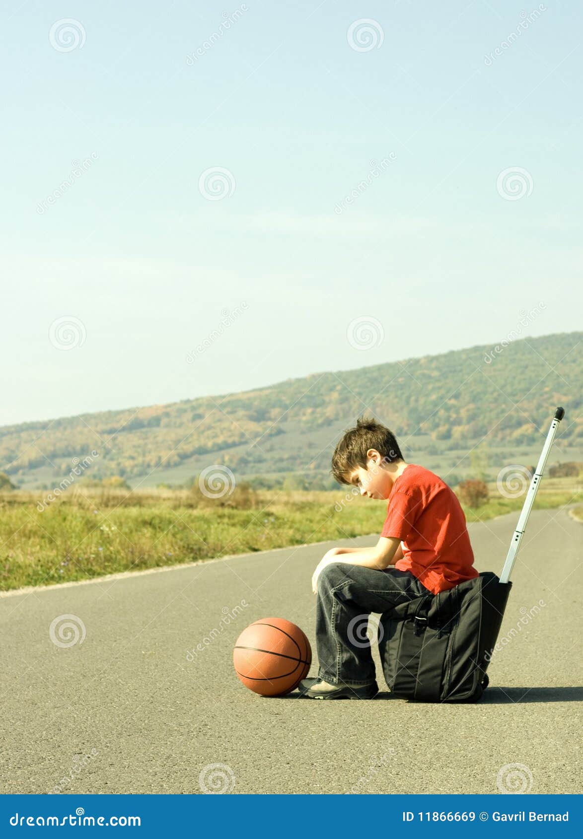 Young boy hitching on road stock image. Image of rural - 11866669