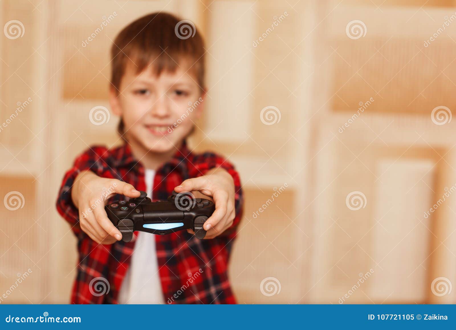 Young Boy Holding Game Controller Playing Video Games. Stock Image ...