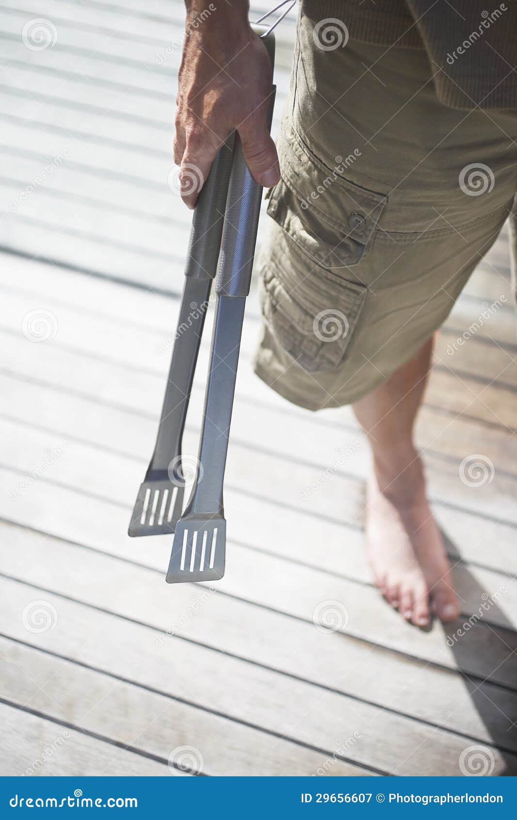 Young Boy Holding Kitchen Tongs Stock Image - Image of people, clip ...